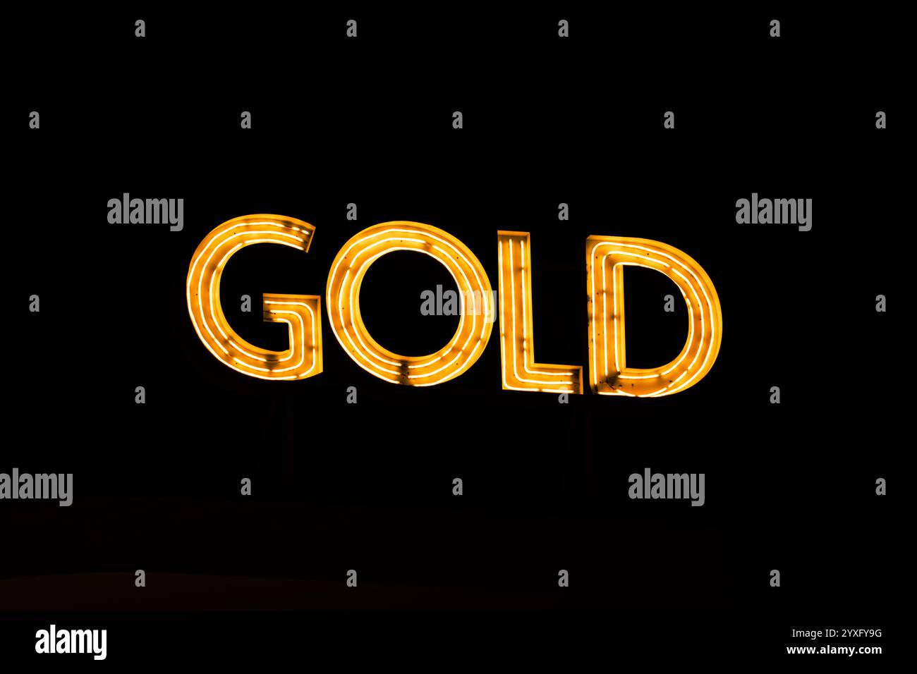gold font and sign for promotion event Stock Photo - Alamy