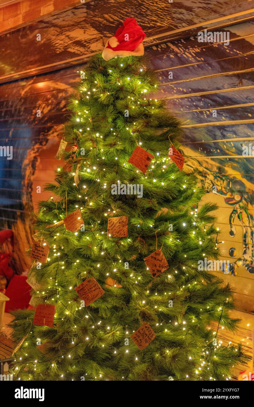 Christmas stockings tree, and decorations Stock Photo - Alamy