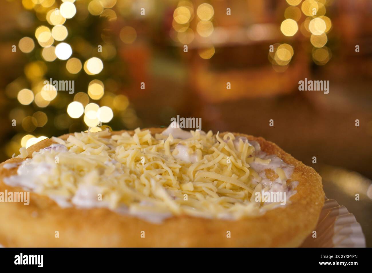 deep fried langos at christmas market Stock Photo - Alamy