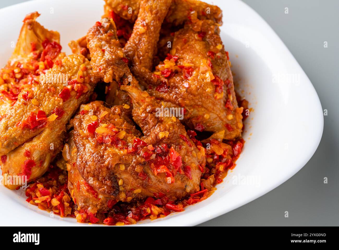 Ayam sambal balado or spicy fried chicken is Traditional food from ...