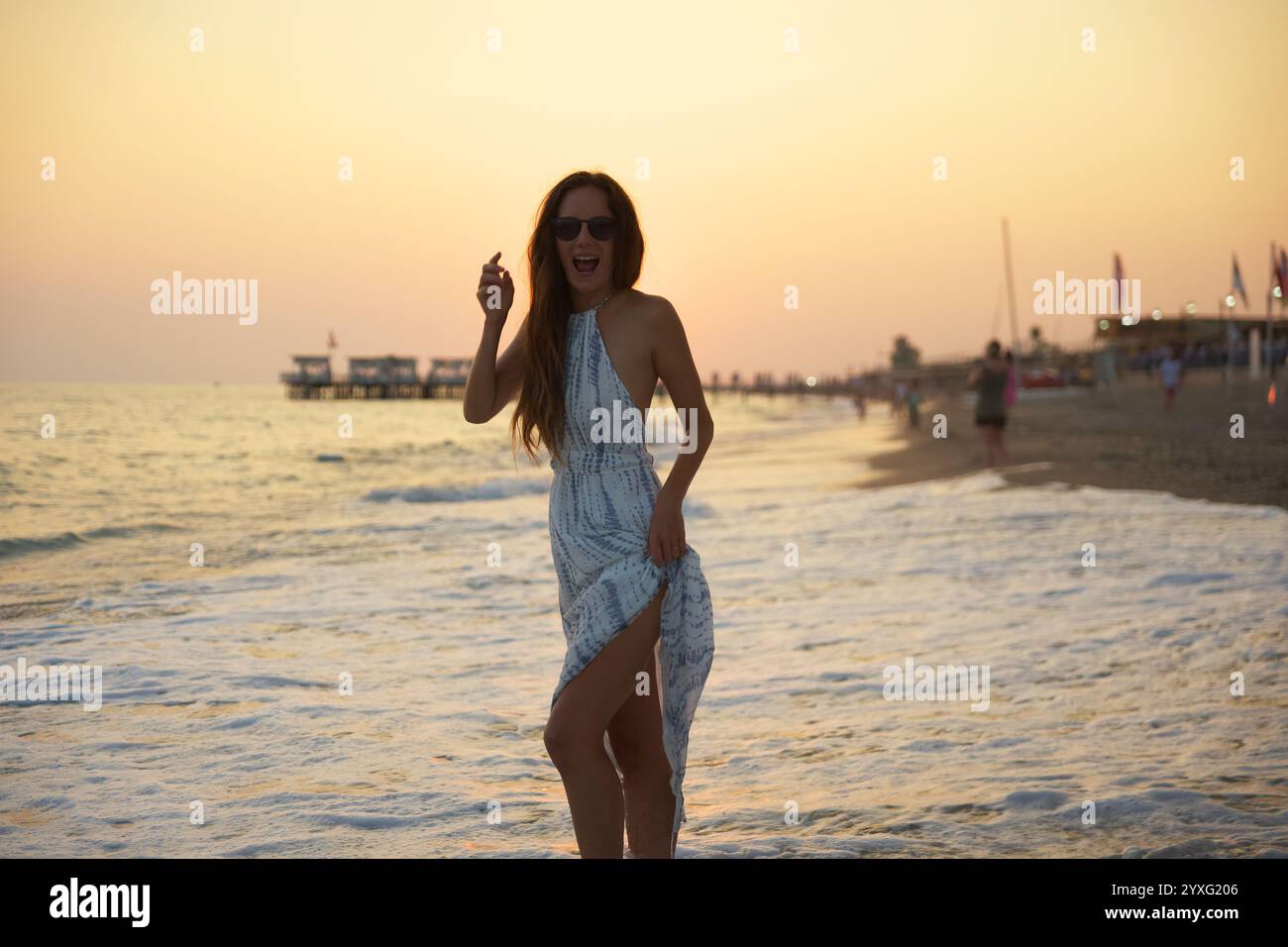 Beach bikini poses hi-res stock photography and images - Alamy