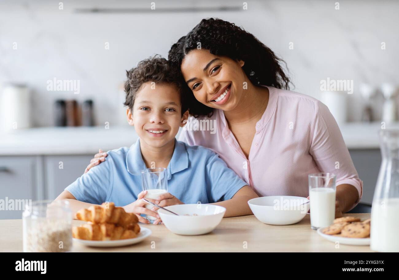 Family enjoying breakfast together in a cozy kitchen at home Stock ...