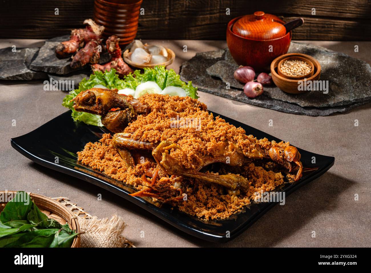 Ayam Kampung Goreng kremes. Traditional fried chicken with spice crumbs ...