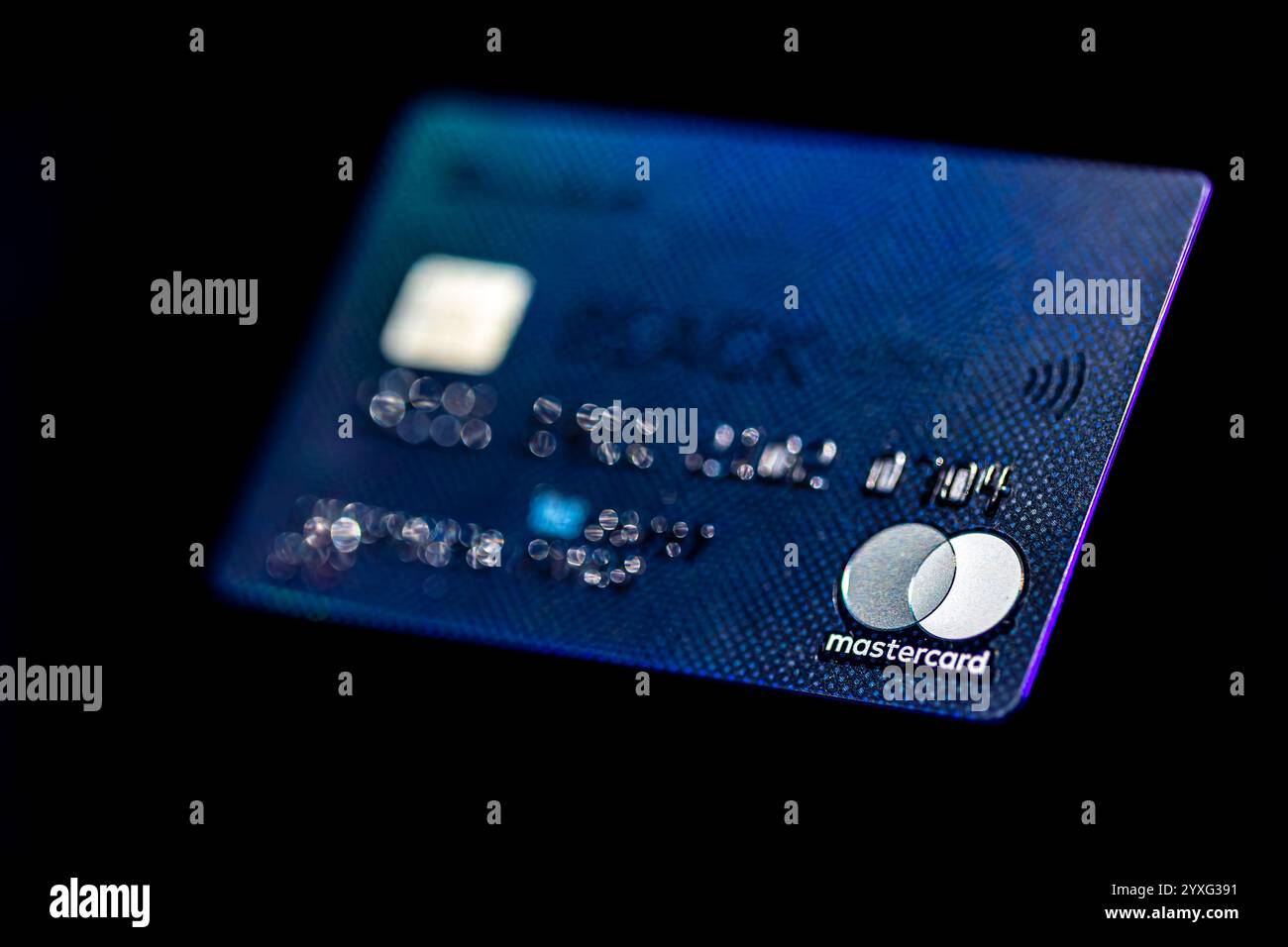 Ukraine, Vinnytsia - December 11, 2024: Mastercard bank credit card ...