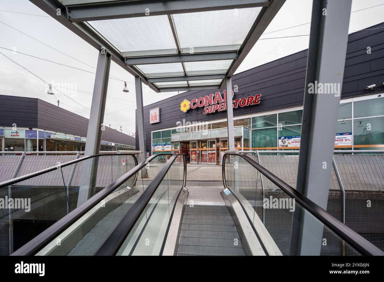 Turin, Piedmont, Italy - December 13, 2024: Inclined moving walkway at ...