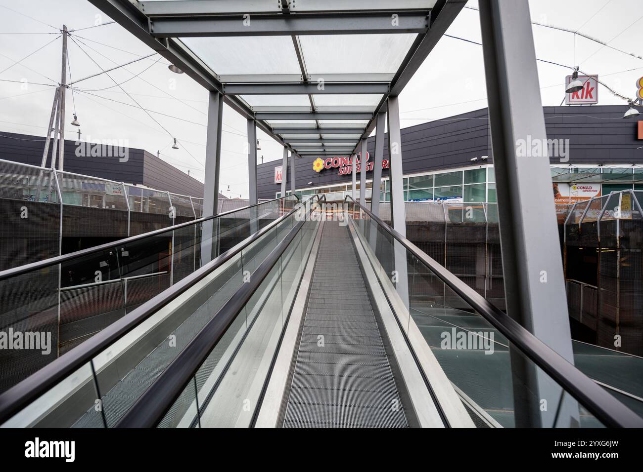 Turin, Piedmont, Italy - December 13, 2024: Inclined moving walkway at ...