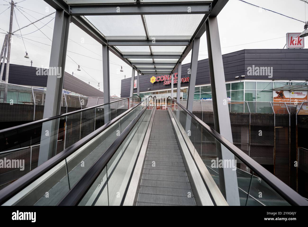 Turin, Piedmont, Italy - December 13, 2024: Inclined moving walkway at ...