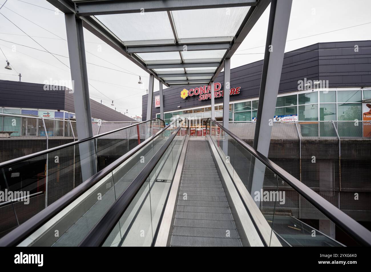 Turin, Piedmont, Italy - December 13, 2024: Inclined moving walkway at ...