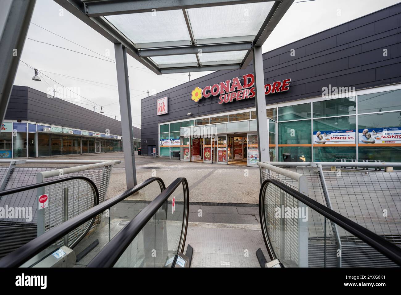 Turin, Piedmont, Italy - December 13, 2024: Inclined moving walkway at ...