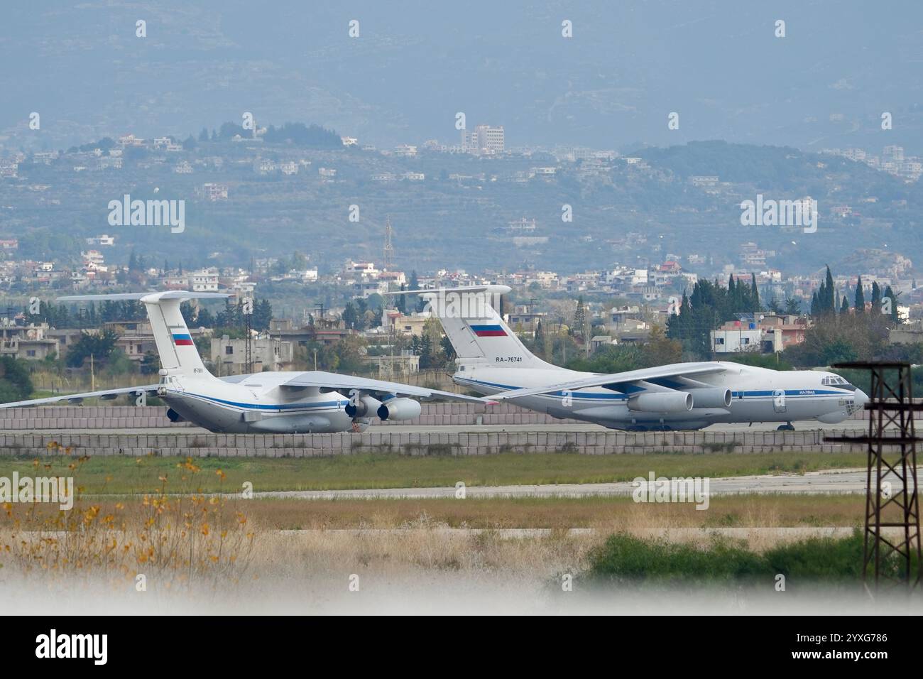 Russian soldiers withdraw from the Khmeimim Air Base near the Syrian ...