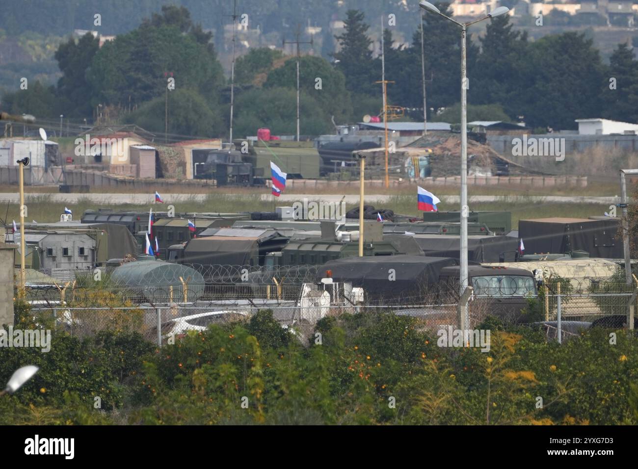 Russian soldiers withdraw from the Khmeimim Air Base near the Syrian ...