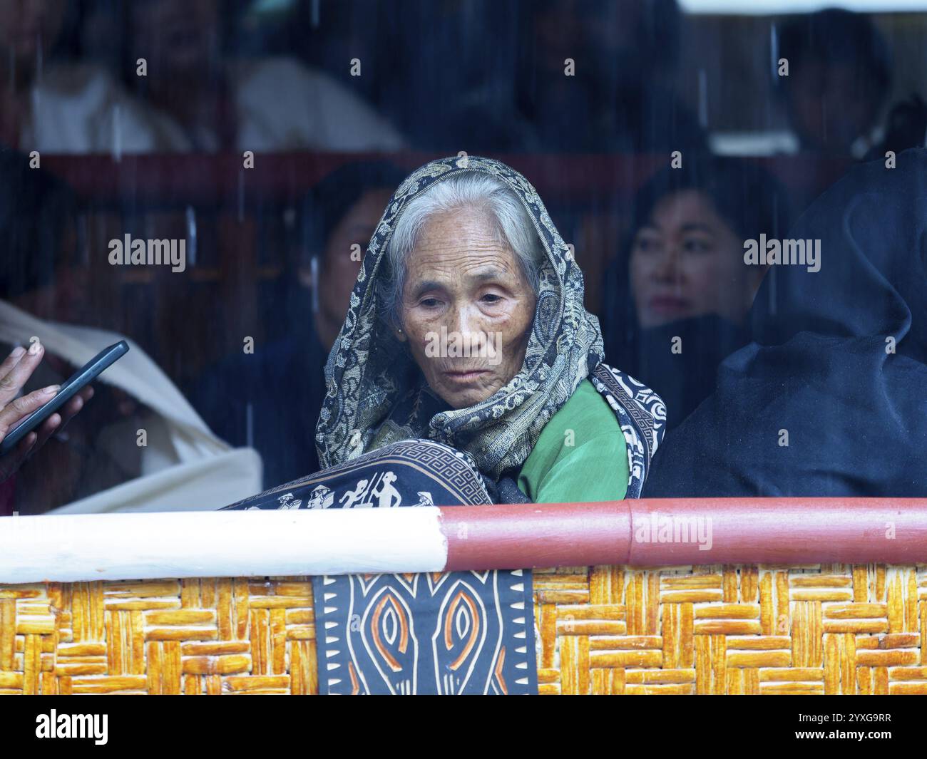 Dreamy old woman, looking inwards, Tana Toraja, Sulawesi, Indonesia ...