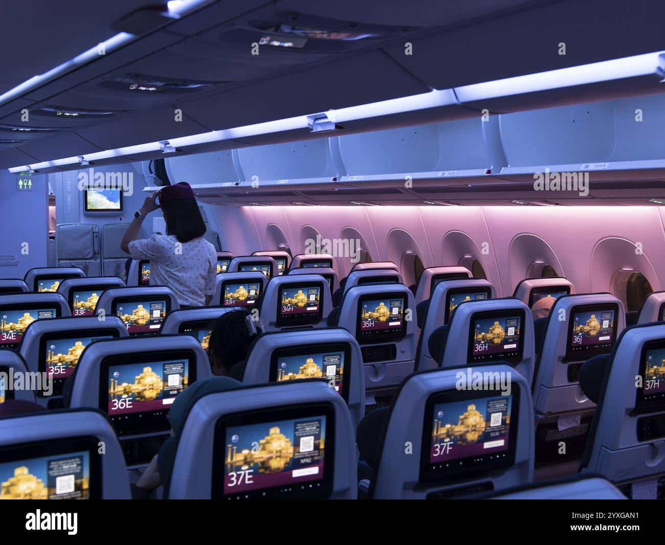Aircraft interior, empty cabin, seats with screens, Qatar Airways Stock ...