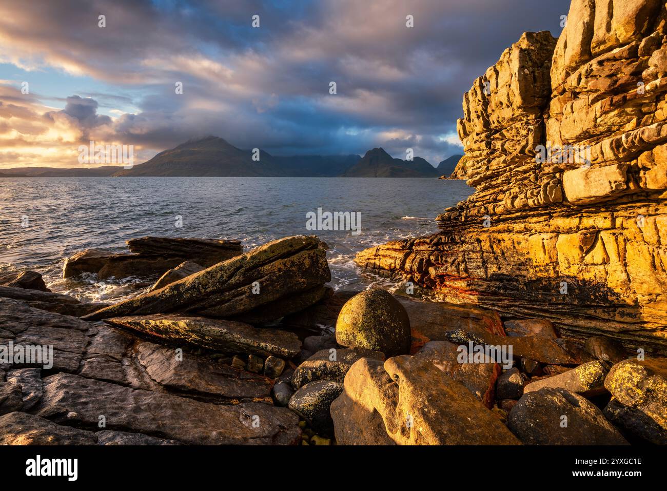 Dramatic coastal views with beautiful golden light at Elgol on The Isle ...