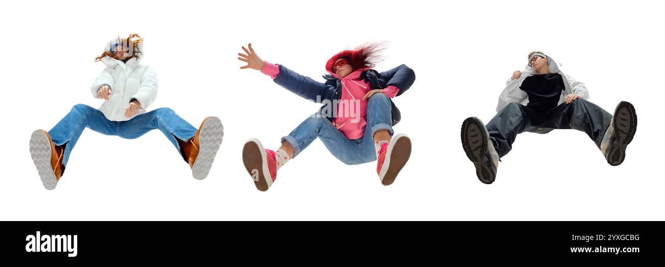 Three stylish young people in creative low-angle poses, in modern ...