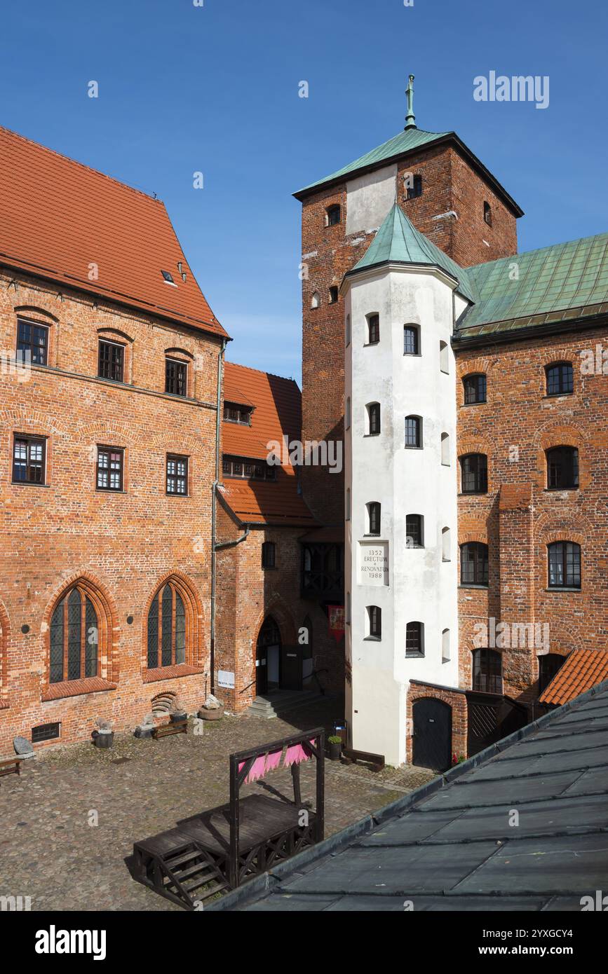 Medieval courtyard with historic buildings and towers, museum ...