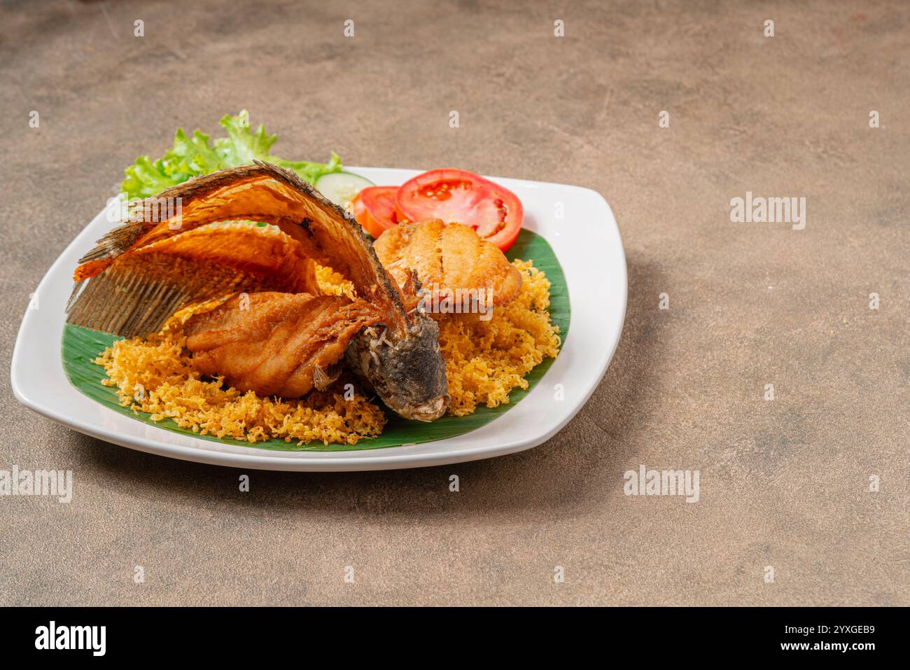 Ikan goreng tepung hi-res stock photography and images - Alamy