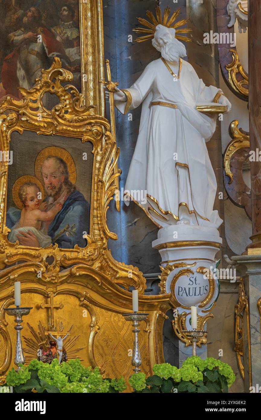 Side altar with the figure of St Paul in the rococo church of St Ulrich ...