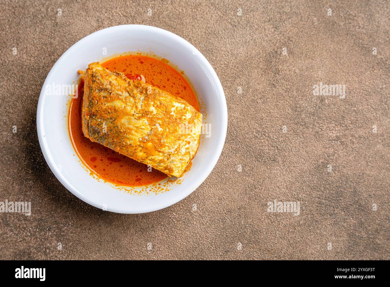 snapper curry fish from padang, west sumatera, indonesia Stock Photo ...