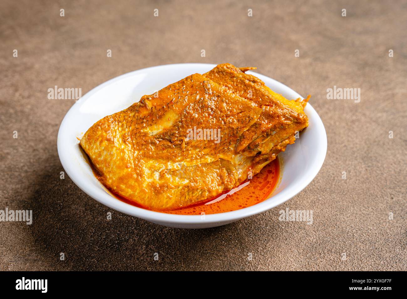 snapper curry fish from padang, west sumatera, indonesia Stock Photo ...