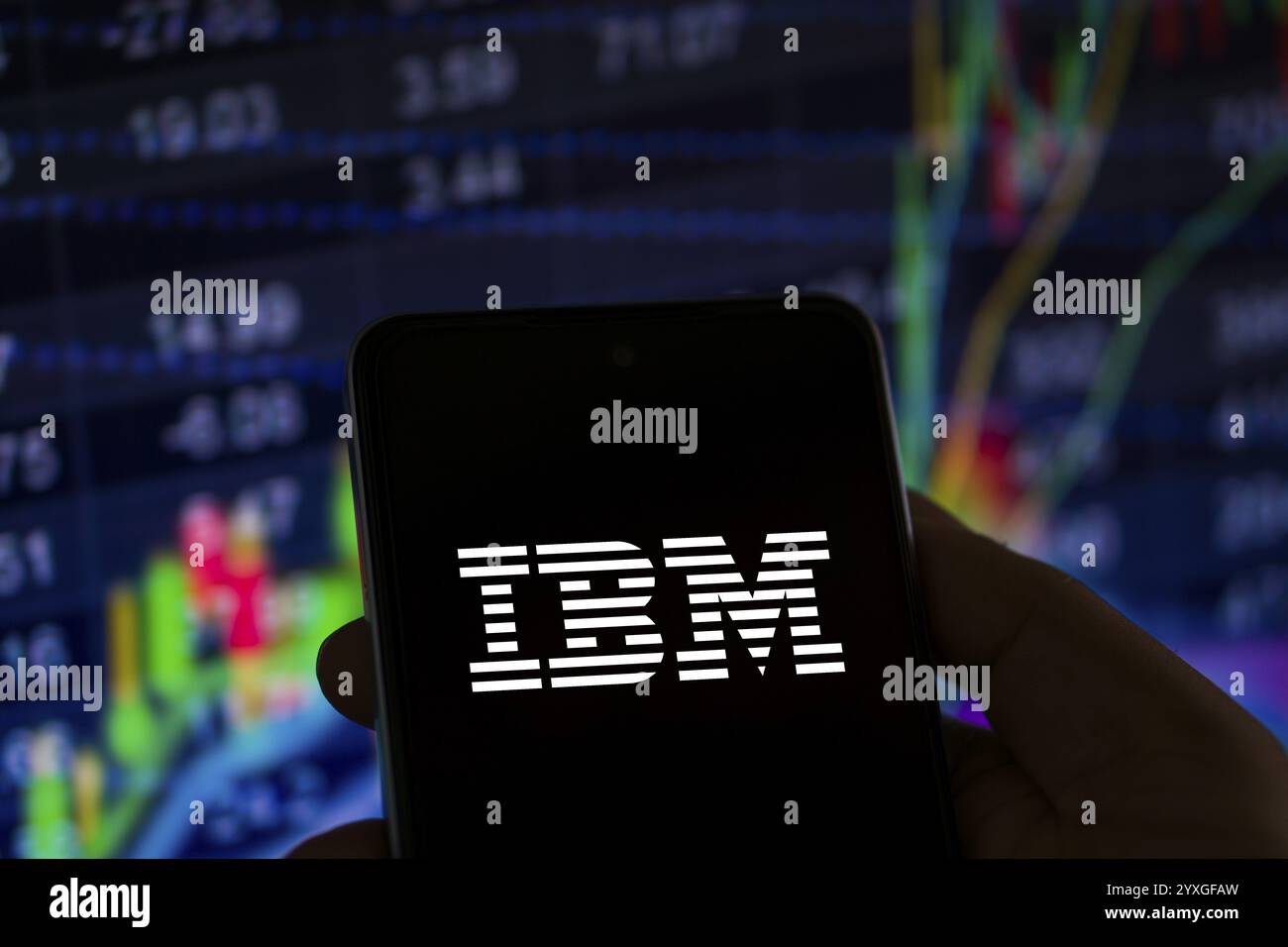 In this photo illustration, the International Business Machines (IBM ...