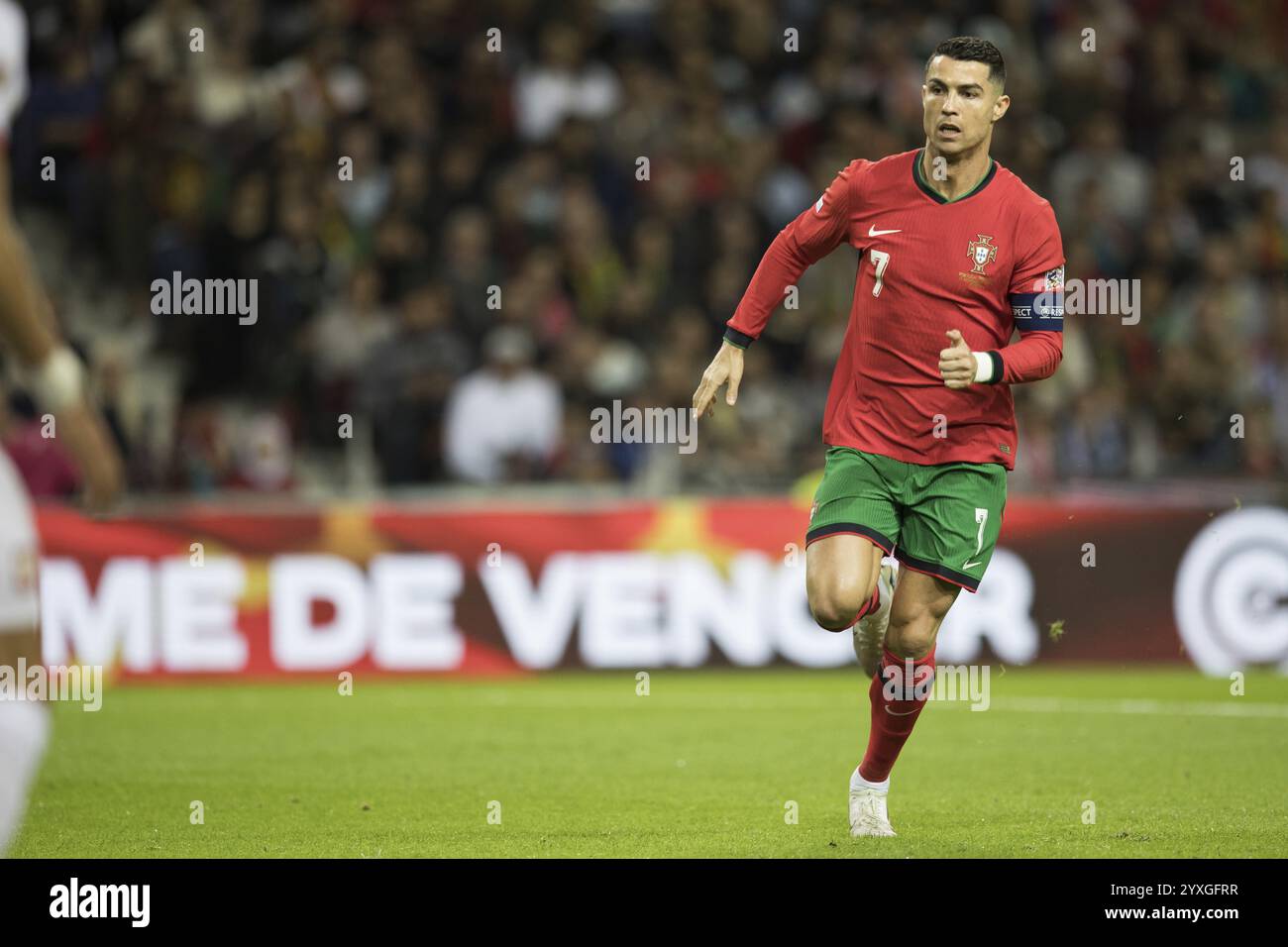 Football match, captain Cristiano RONALDO CR7 Portugal running slowly ...