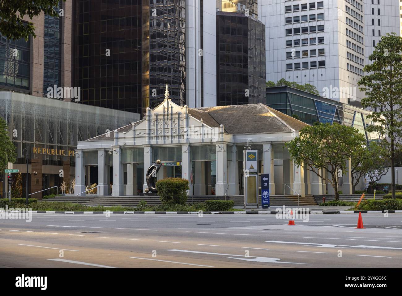 Raffles Place Station, entrance to the metro, with sculpture Symphony ...