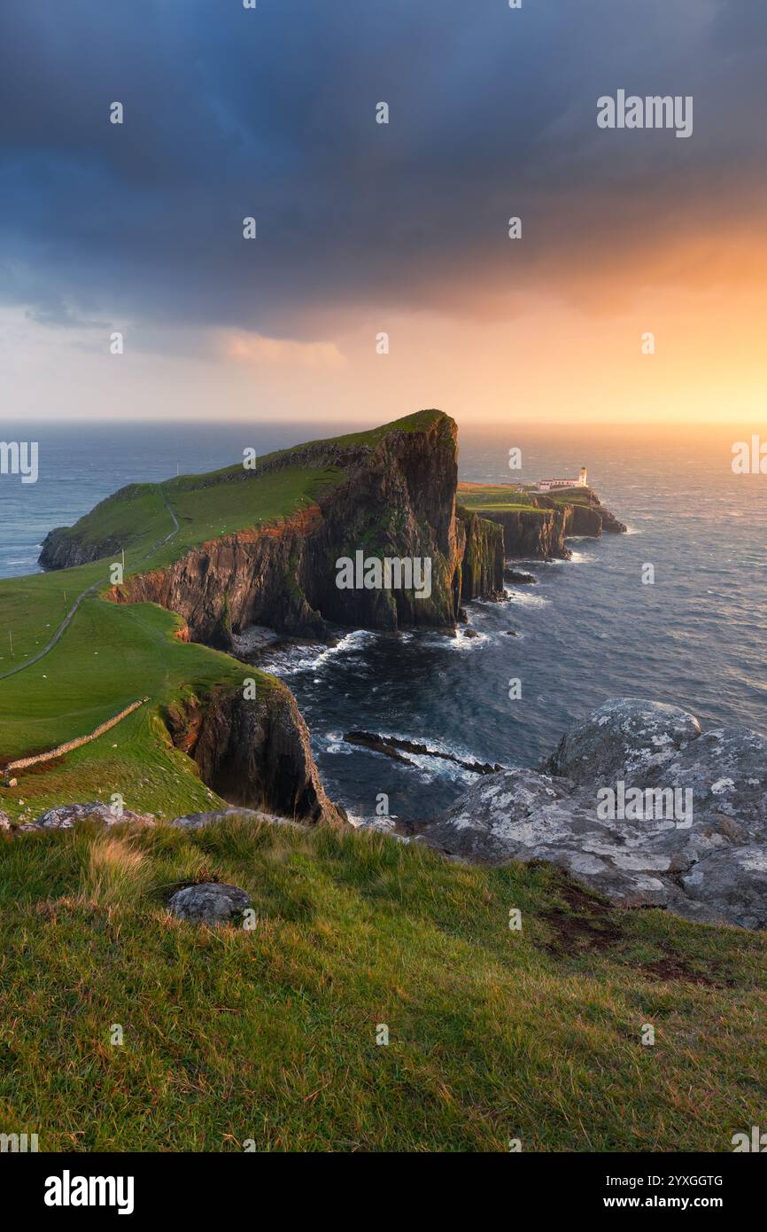 Colourful sunset light at Neist Point Lighthouse on The Isle of Skye ...