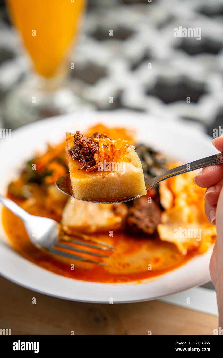 Lontong sayur or vegetable rice cake is an Indonesian traditional rice ...