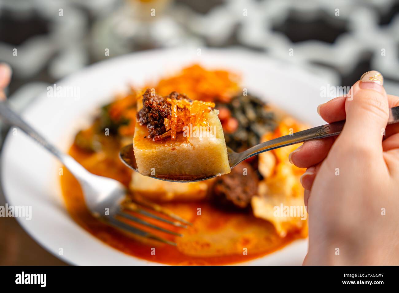 Lontong sayur or vegetable rice cake is an Indonesian traditional rice ...