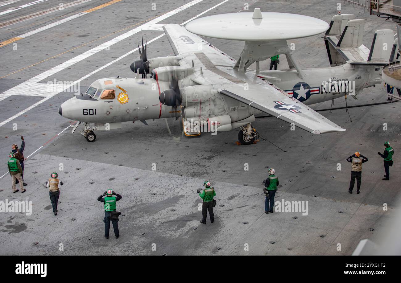 241209-N-OL176-1277 ATLANTIC OCEAN (Dec. 9, 2024) Sailors direct an E ...