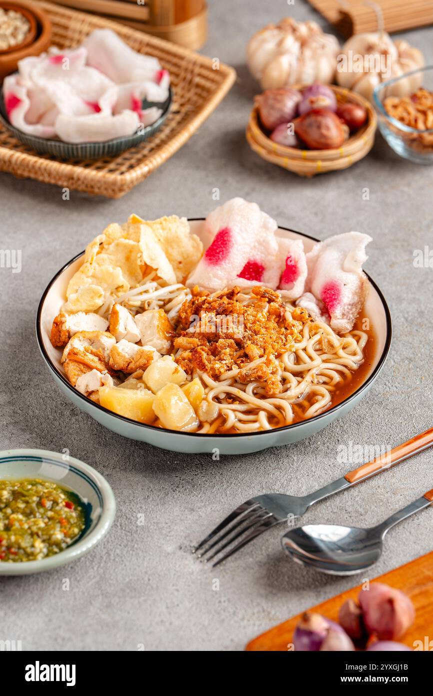 Emie, mie rebus is a noodle soup made from broth shrimp, topping boiled ...