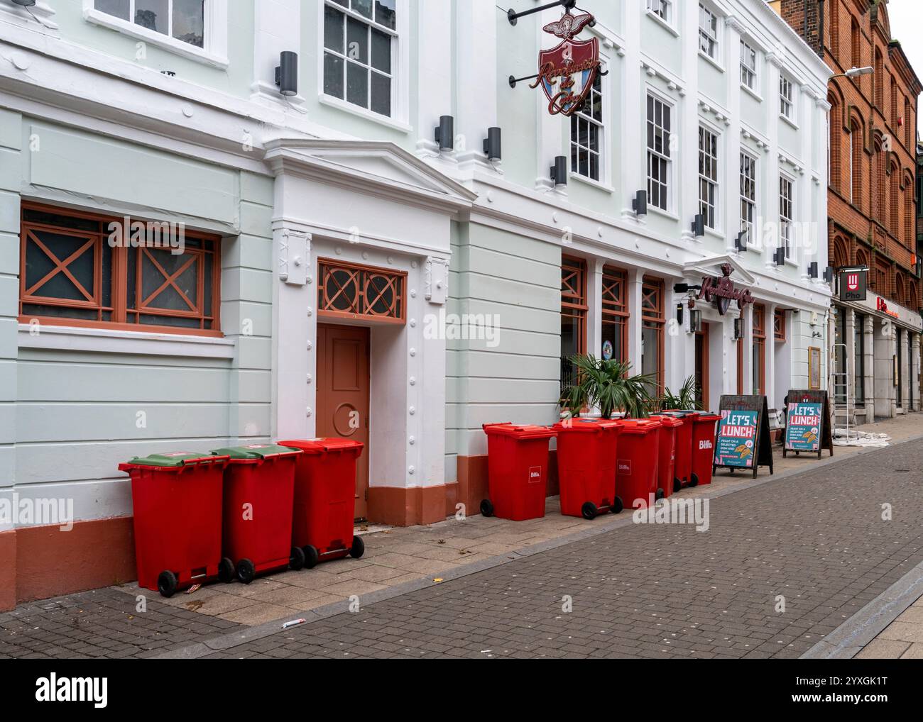 Number of Biffa red wheelie bins outside public house in Norwich ...