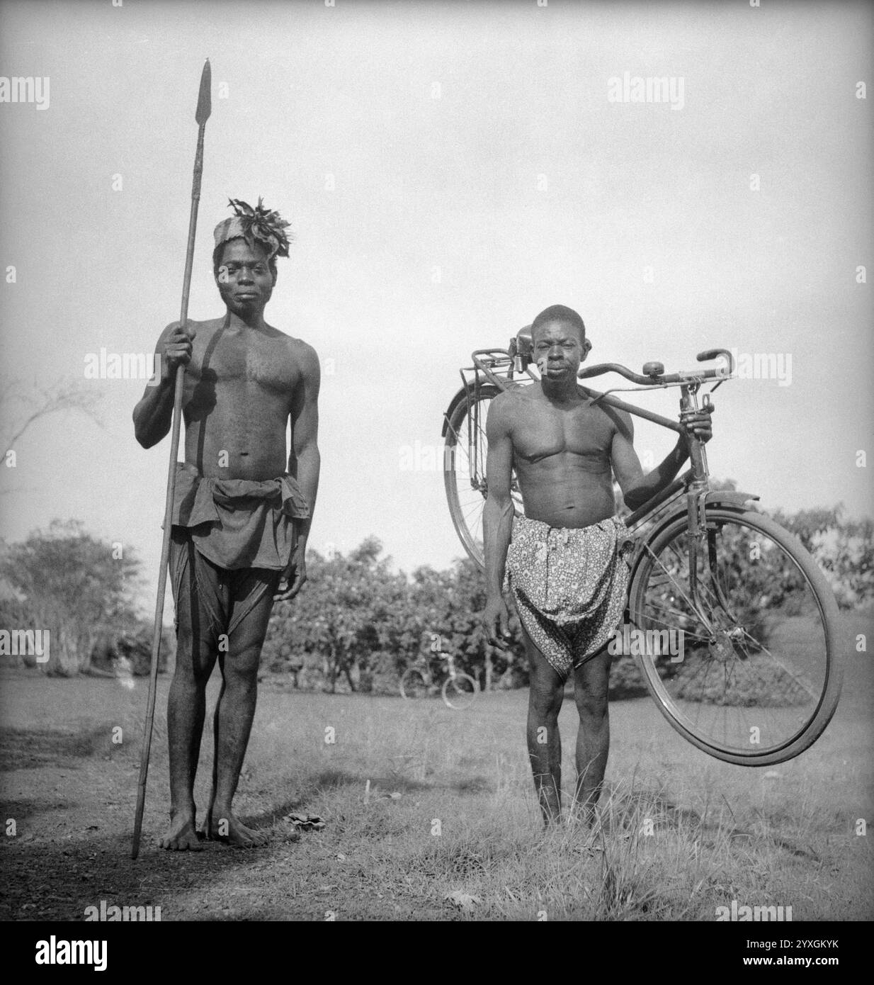 Belgian Congo, Faradje: Two young men of the Azande tribe, one with a ...