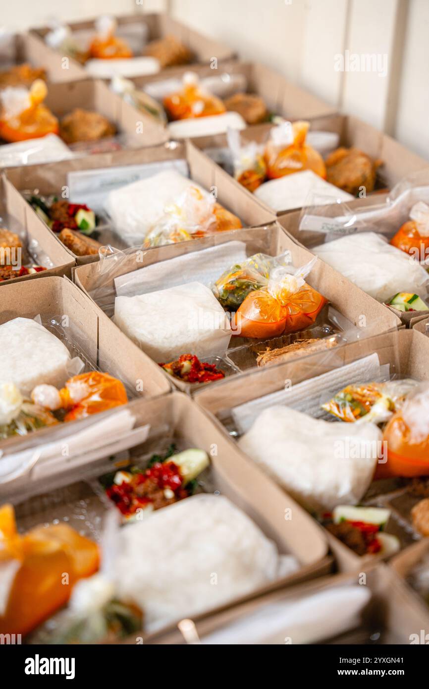 In Indonesian it is called Rice Box or Nasi kotak with perkedel kentang ...