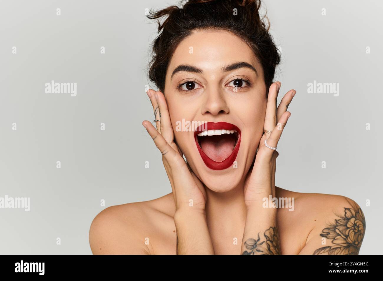 Radiant young woman beams joy hi-res stock photography and images - Alamy