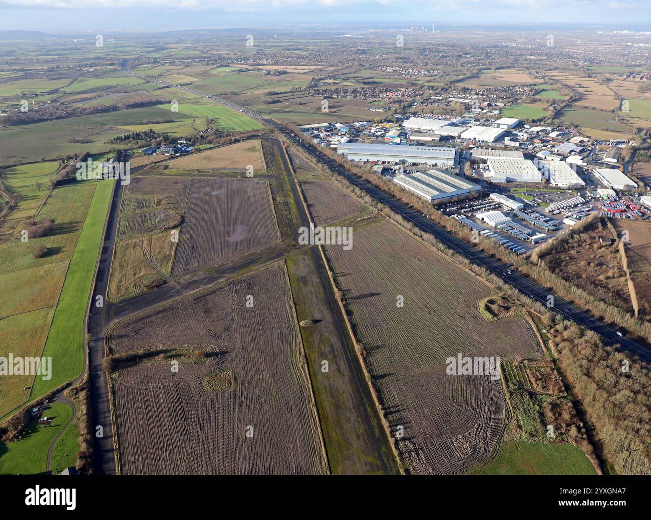 aerial view across Stretton Airfield and the M56 motorway towards ...