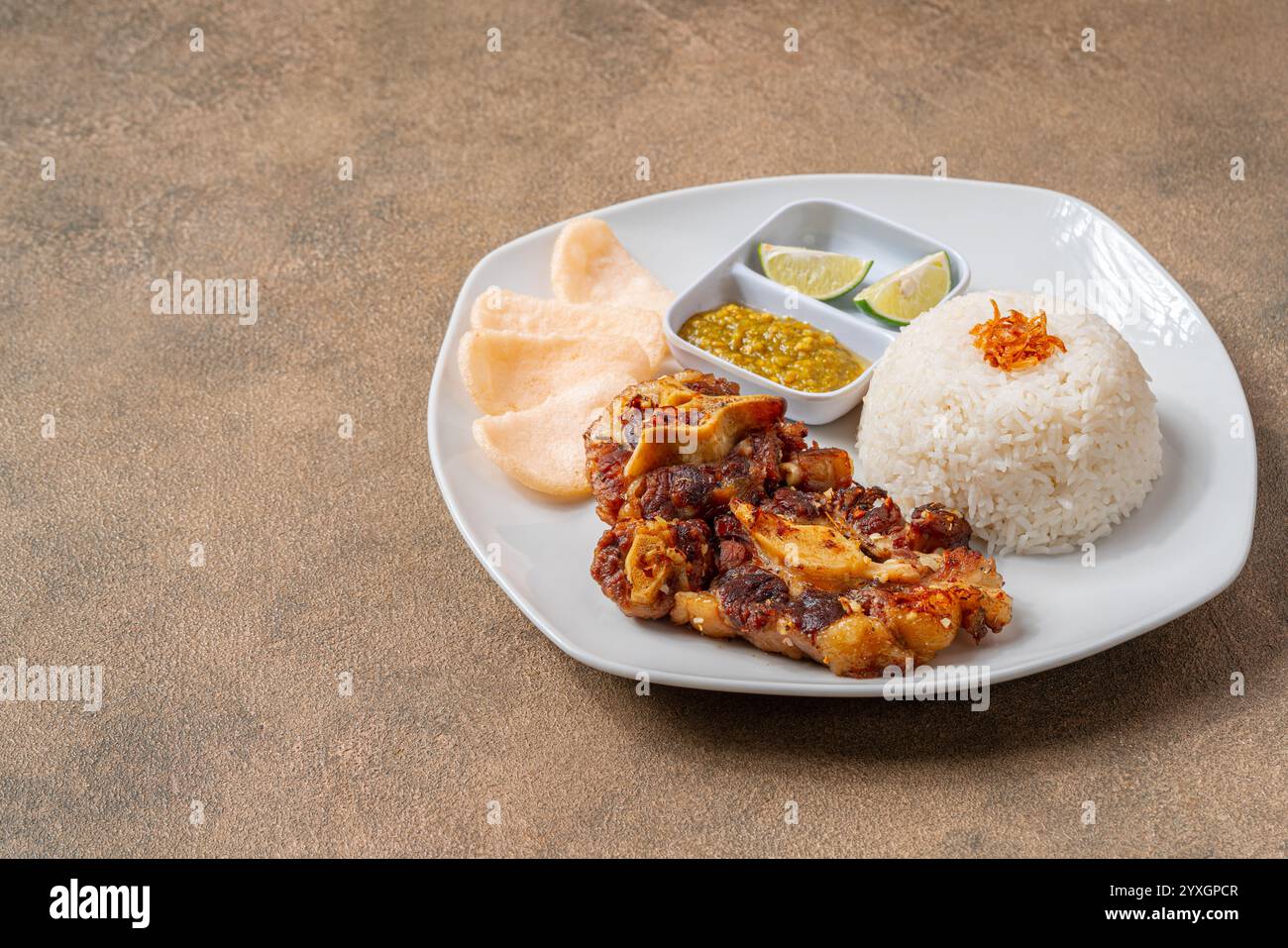 Grilled beef ribs with bbq sauce and rice Stock Photo - Alamy