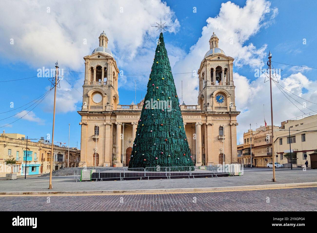 Christmas Tree in Front of Twin Bell Towers of Historic Christ the King ...
