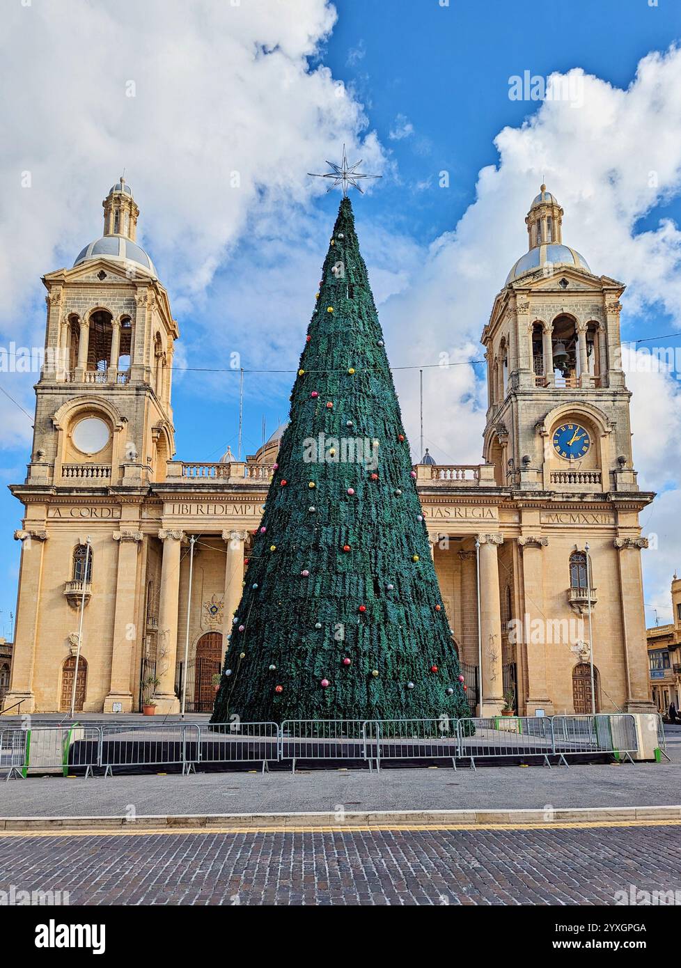 Christmas Tree in Front of Twin Bell Towers of Historic Christ the King ...