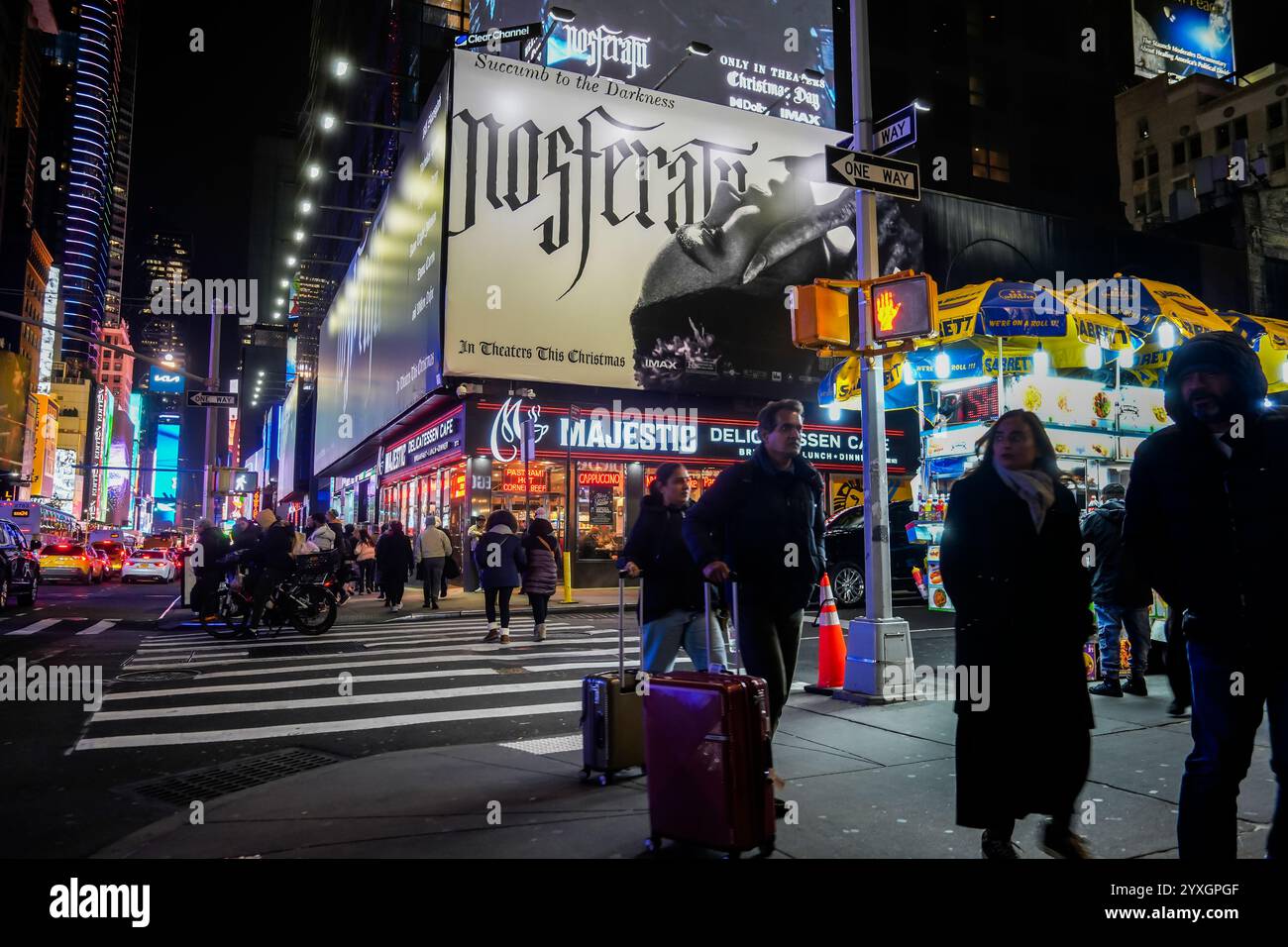 Visitors to Times Square in New York on Wednesday, December 4, 2024 ...