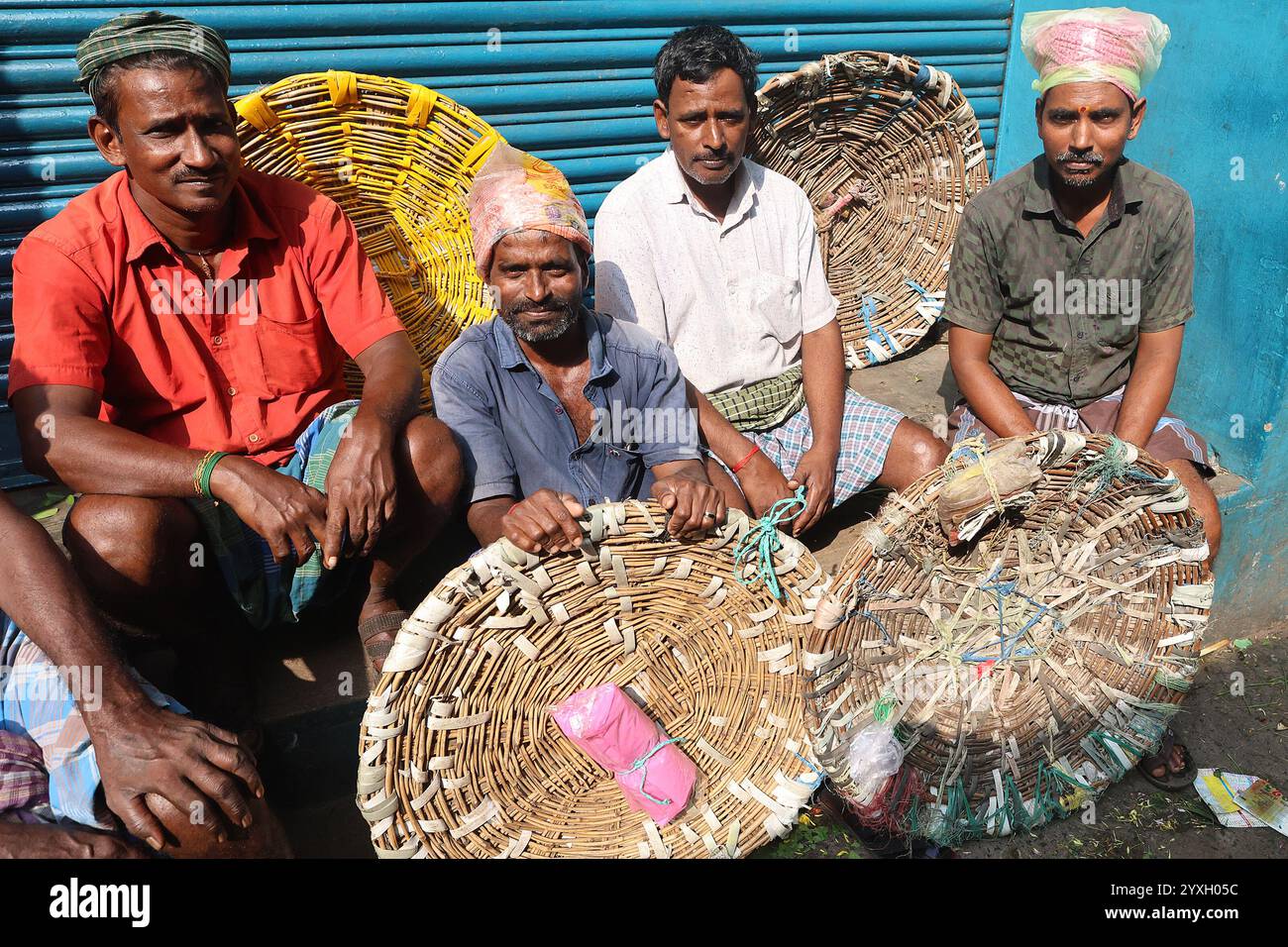 Portrait of a group of coolies in the George Town district of Chennai ...