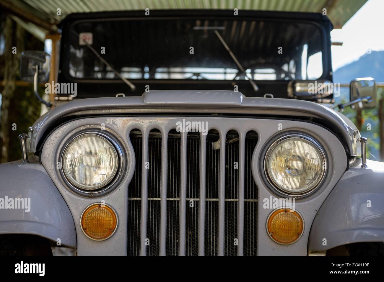 Close-Up Of The Front Of A Vintage Jeep With Headlights And Grill ...