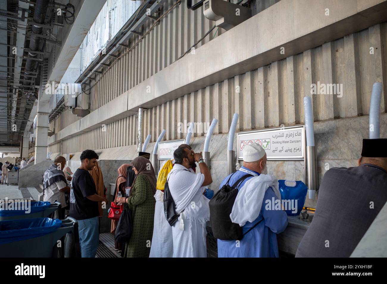 Mecca, Saudi Arabia - June 4, 2024: Hajj and Umrah pilgrims drinking ...