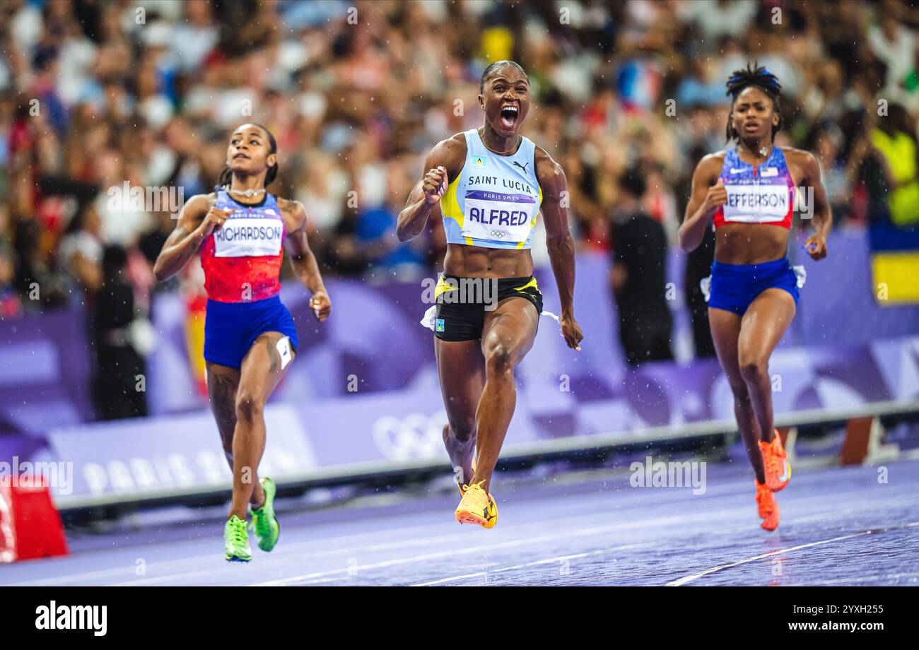 Julien Alfred winning in the 100 meters relay at the Paris 2024 Olympic ...