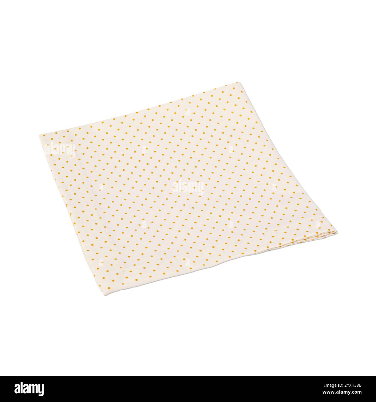 Folded light brown tissue napkin with brown dots isolated over white ...