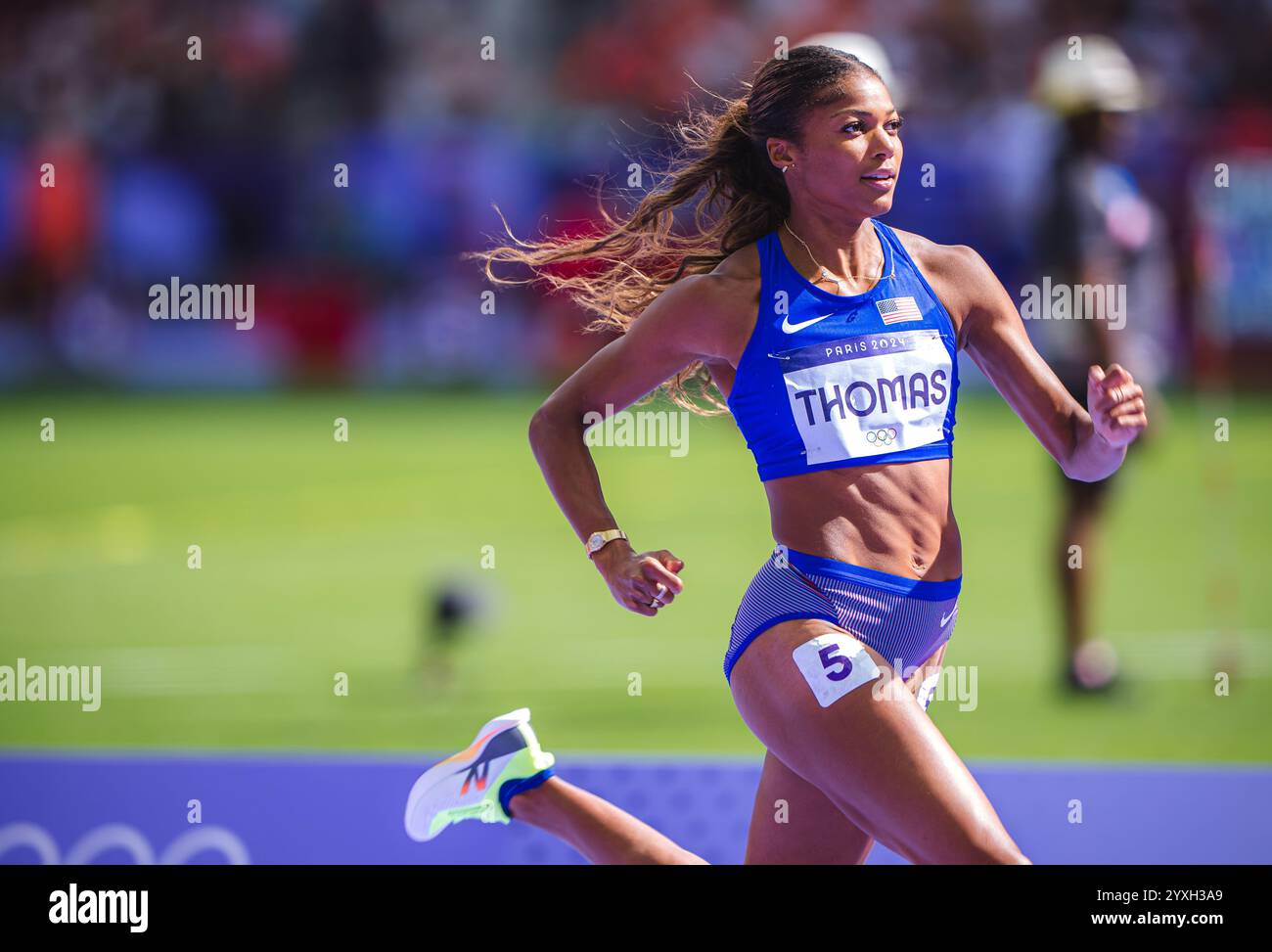 Gabrielle Thomas participating in the 200 meters at the Paris 2024 ...