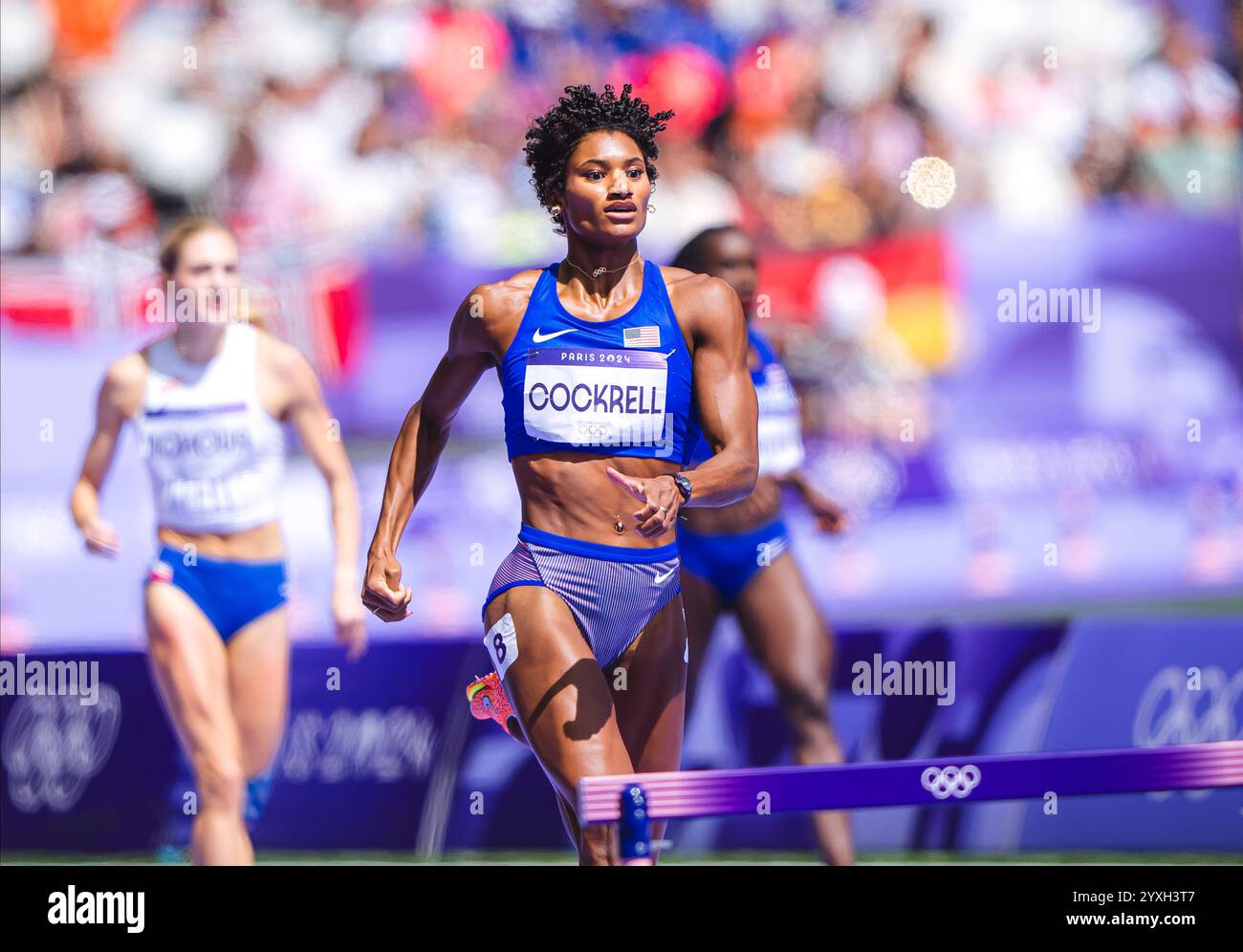 Anna Cockrell participating in the 400 meters hurdles at the Paris 2024 ...
