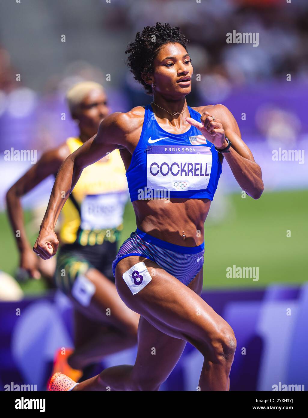 Anna Cockrell participating in the 400 meters hurdles at the Paris 2024 ...