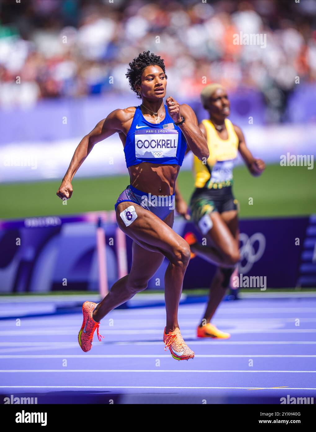 Anna Cockrell participating in the 400 meters hurdles at the Paris 2024 ...